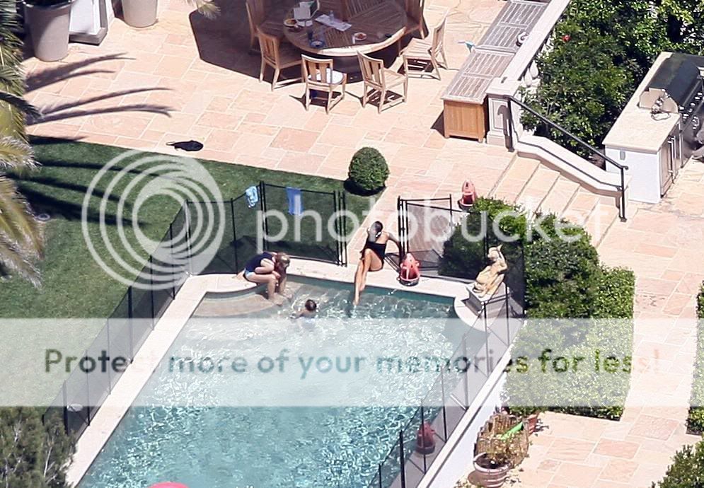 Victoria Beckham in the pool at house in Beverly Hills 4/19 | Lipstick ...